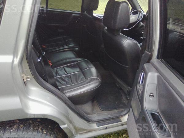 Grey Jeep Grand Cherokee 1999 in Daugavpils, with an engine capacity of 3.10 L and mileage of 207 thousand km for 2250 €, photo 7 on AUTOMOTO.COM.LV