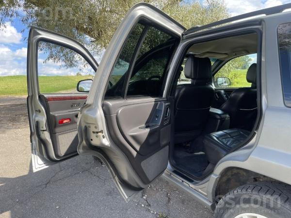 Grey Jeep Grand Cherokee 1999 in Daugavpils, with an engine capacity of 3.10 L and mileage of 208 thousand km for 2650 €, photo 7 on AUTOMOTO.COM.LV