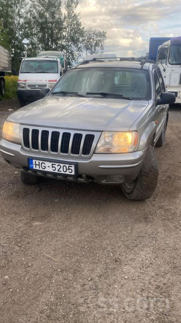 Pelēks Jeep Grand Cherokee 2000 Rīga, ar dzinēja tilpumu 3.10 L un nobraukumu 291 tūkst. km par 2300 €, foto 4 vietnē AUTOMOTO.COM.LV