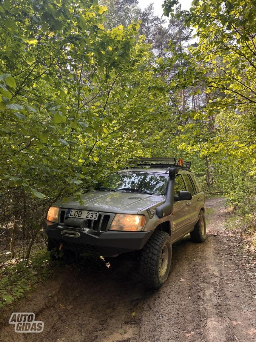 Grey Jeep Grand Cherokee 2000 in Alytus, with an engine capacity of 4.70 L and mileage of 380 thousand km for 2200 €, photo 1 on AUTOMOTO.COM.LV