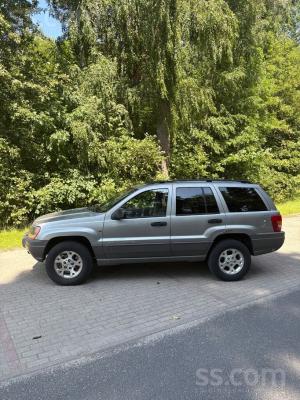Pelēks Jeep Grand Cherokee 2000 Rīga, ar dzinēja tilpumu 4.70 L un nobraukumu 197 tūkst. km par 4300 €, foto 3 vietnē AUTOMOTO.COM.LV