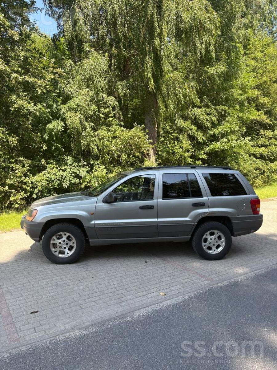 Pelēks Jeep Grand Cherokee 2000 Rīga, ar dzinēja tilpumu 4.70 L un nobraukumu 197 tūkst. km par 4300 €, foto 3 vietnē AUTOMOTO.COM.LV