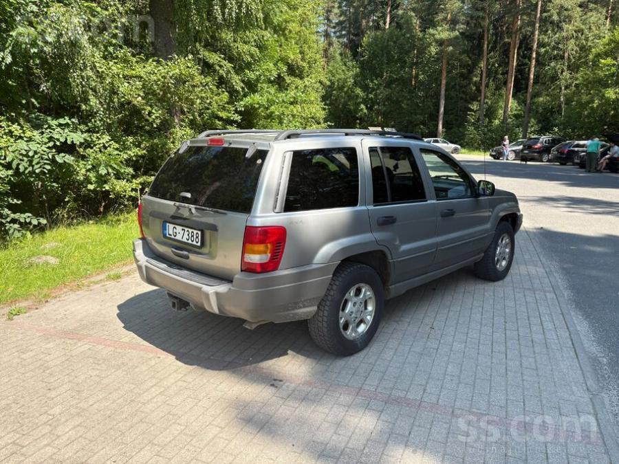 Pelēks Jeep Grand Cherokee 2000 Rīga, ar dzinēja tilpumu 4.70 L un nobraukumu 197 tūkst. km par 4300 €, foto 4 vietnē AUTOMOTO.COM.LV