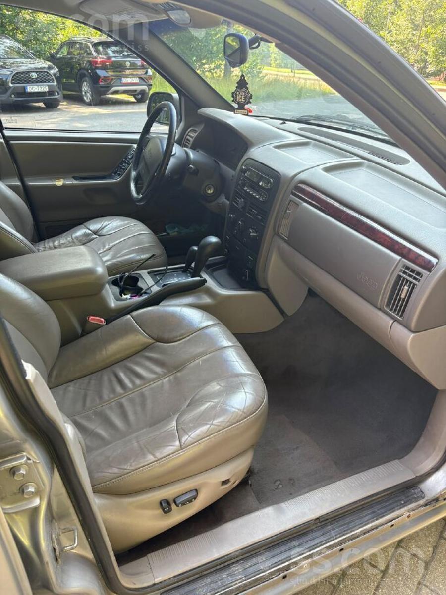 Pelēks Jeep Grand Cherokee 2000 Rīga, ar dzinēja tilpumu 4.70 L un nobraukumu 197 tūkst. km par 4300 €, foto 8 vietnē AUTOMOTO.COM.LV