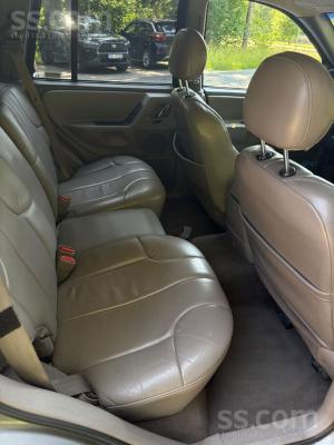 Pelēks Jeep Grand Cherokee 2000 Rīga, ar dzinēja tilpumu 4.70 L un nobraukumu 197 tūkst. km par 4300 €, foto 10 vietnē AUTOMOTO.COM.LV