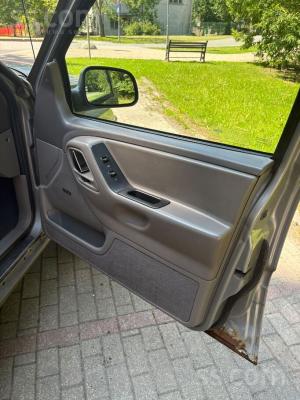 Pelēks Jeep Grand Cherokee 2000 Rīga, ar dzinēja tilpumu 4.70 L un nobraukumu 197 tūkst. km par 4300 €, foto 11 vietnē AUTOMOTO.COM.LV
