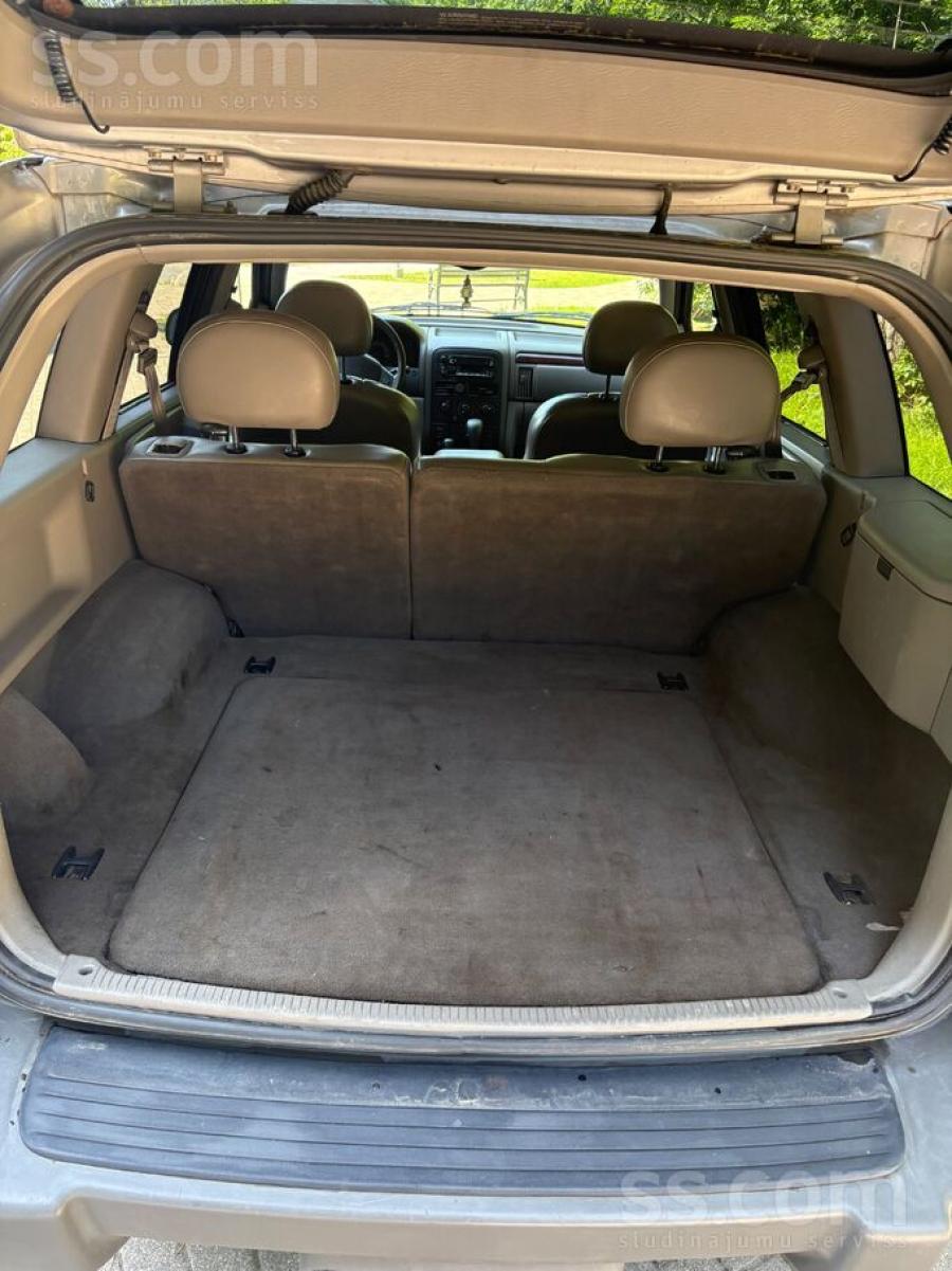 Pelēks Jeep Grand Cherokee 2000 Rīga, ar dzinēja tilpumu 4.70 L un nobraukumu 197 tūkst. km par 4300 €, foto 14 vietnē AUTOMOTO.COM.LV
