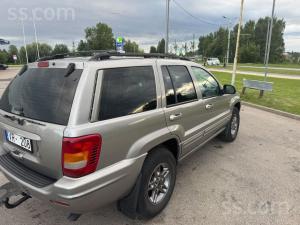 Grey Jeep Grand Cherokee 2000 in Riga, with an engine capacity of 3.10 L and mileage of 298 thousand km for 2900 €, photo 6 on AUTOMOTO.COM.LV
