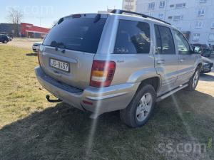 Pelēks Jeep Grand Cherokee 2001 Liepāja, ar dzinēja tilpumu 3.10 L un nobraukumu 314 tūkst. km par 2000 €, foto 5 vietnē AUTOMOTO.COM.LV