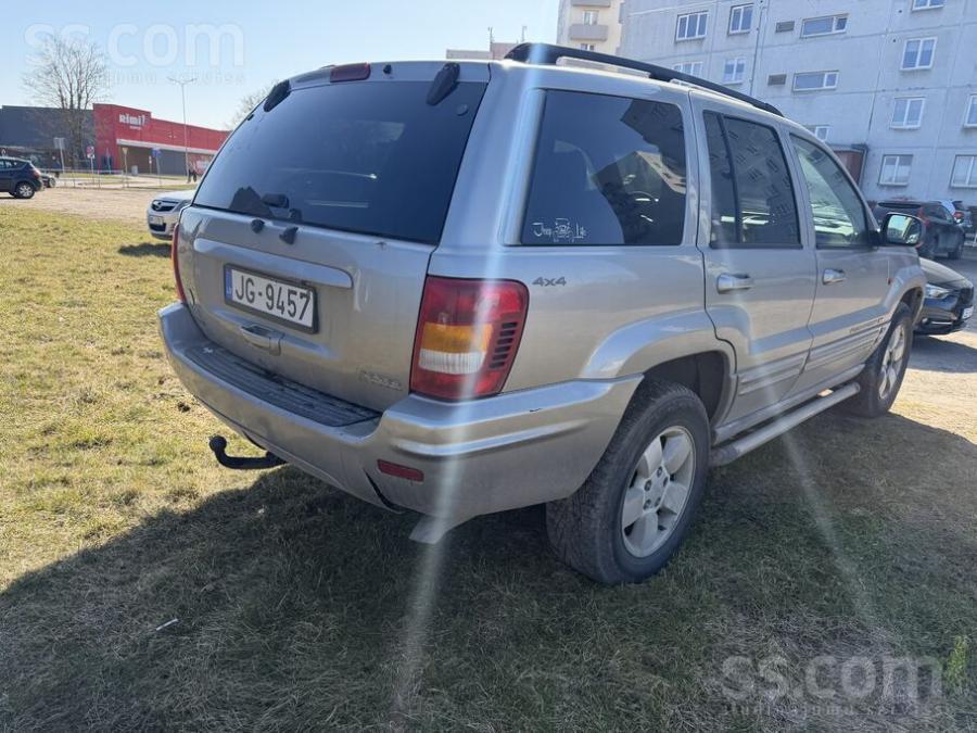 Pelēks Jeep Grand Cherokee 2001 Liepāja, ar dzinēja tilpumu 3.10 L un nobraukumu 314 tūkst. km par 2000 €, foto 5 vietnē AUTOMOTO.COM.LV