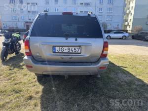 Pelēks Jeep Grand Cherokee 2001 Liepāja, ar dzinēja tilpumu 3.10 L un nobraukumu 314 tūkst. km par 2000 €, foto 6 vietnē AUTOMOTO.COM.LV