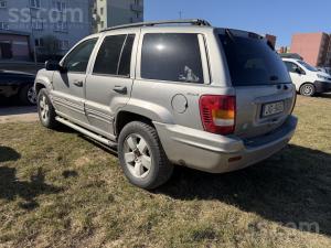 Pelēks Jeep Grand Cherokee 2001 Liepāja, ar dzinēja tilpumu 3.10 L un nobraukumu 314 tūkst. km par 2000 €, foto 7 vietnē AUTOMOTO.COM.LV