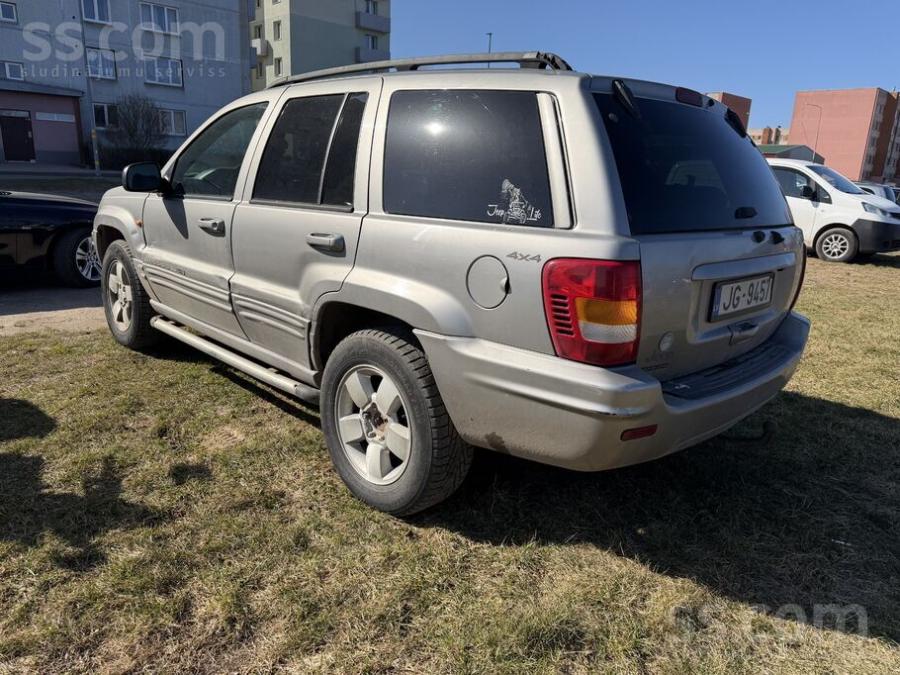 Pelēks Jeep Grand Cherokee 2001 Liepāja, ar dzinēja tilpumu 3.10 L un nobraukumu 314 tūkst. km par 2000 €, foto 7 vietnē AUTOMOTO.COM.LV