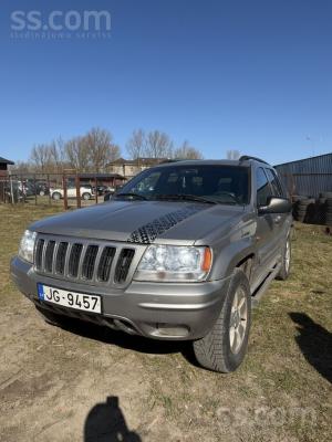 Pelēks Jeep Grand Cherokee 2001 Liepāja, ar dzinēja tilpumu 3.10 L un nobraukumu 314 tūkst. km par 2000 €, foto 9 vietnē AUTOMOTO.COM.LV