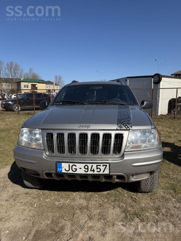 Pelēks Jeep Grand Cherokee 2001 Liepāja, ar dzinēja tilpumu 3.10 L un nobraukumu 314 tūkst. km par 1950 €, foto 1 vietnē AUTOMOTO.COM.LV