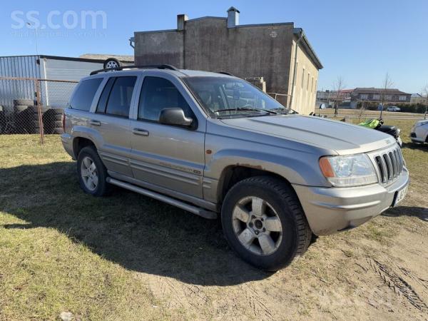 Pelēks Jeep Grand Cherokee 2001 Liepāja, ar dzinēja tilpumu 3.10 L un nobraukumu 314 tūkst. km par 1950 €, foto 3 vietnē AUTOMOTO.COM.LV