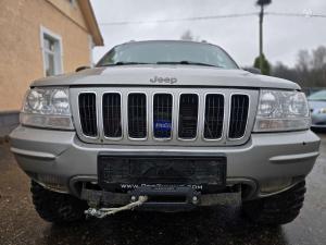 Grey Jeep Grand Cherokee 2002 in Rokiskis, with an engine capacity of 2.69 L and mileage of 240 thousand km for 2299 €, photo  on AUTOMOTO.COM.LV