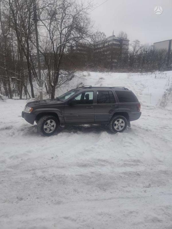 Grey Jeep Grand Cherokee 2002 in Vilnius, with an engine capacity of 2.69 L and mileage of 325 thousand km for 3850 €, photo 2 on AUTOMOTO.COM.LV
