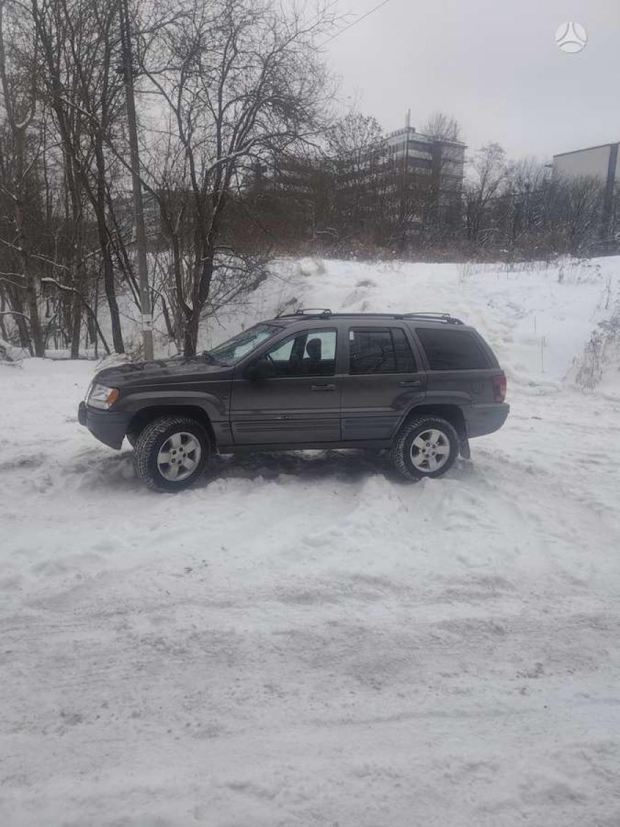 Grey Jeep Grand Cherokee 2002 in Vilnius, with an engine capacity of 2.69 L and mileage of 325 thousand km for 3850 €, photo 2 on AUTOMOTO.COM.LV