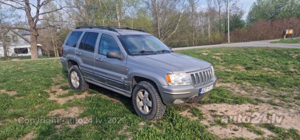 Pelēks Jeep Grand Cherokee 2002 Tartu, ar dzinēja tilpumu 4.70 L un nobraukumu 205 tūkst. km par 5500 €, foto 1 vietnē AUTOMOTO.COM.LV