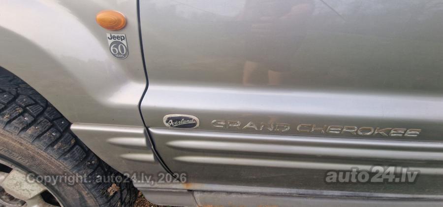 Pelēks Jeep Grand Cherokee 2002 Tartu, ar dzinēja tilpumu 4.70 L un nobraukumu 205 tūkst. km par 5500 €, foto 9 vietnē AUTOMOTO.COM.LV
