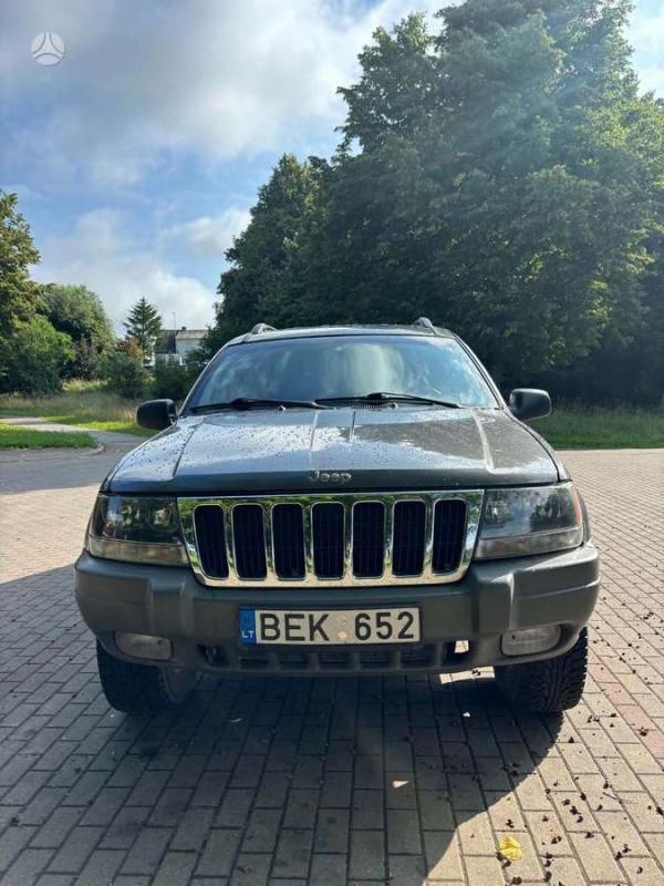 Grey Jeep Grand Cherokee 2002 in Taurage, with an engine capacity of 3.95 L and mileage of 2 thousand km for 3300 €, photo 2 on AUTOMOTO.COM.LV