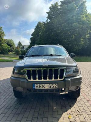 Grey Jeep Grand Cherokee 2002 in Taurage, with an engine capacity of 3.95 L and mileage of 2 thousand km for 3300 €, photo 3 on AUTOMOTO.COM.LV