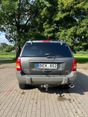 Grey Jeep Grand Cherokee 2002 in Taurage, with an engine capacity of 3.95 L and mileage of 2 thousand km for 3300 €, photo 5 on AUTOMOTO.COM.LV