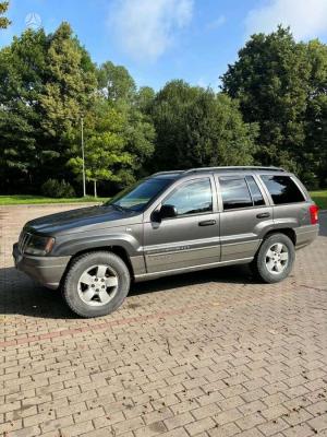 Grey Jeep Grand Cherokee 2002 in Taurage, with an engine capacity of 3.95 L and mileage of 2 thousand km for 3300 €, photo 6 on AUTOMOTO.COM.LV