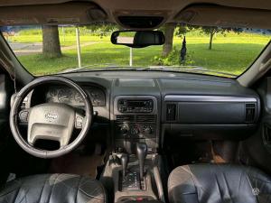 Grey Jeep Grand Cherokee 2002 in Taurage, with an engine capacity of 3.95 L and mileage of 2 thousand km for 3300 €, photo 8 on AUTOMOTO.COM.LV