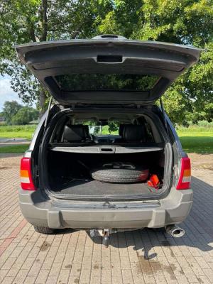 Grey Jeep Grand Cherokee 2002 in Taurage, with an engine capacity of 3.95 L and mileage of 2 thousand km for 3300 €, photo 9 on AUTOMOTO.COM.LV