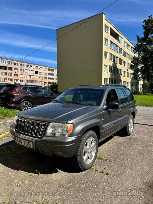 Pelēks Jeep Grand Cherokee 2002 Narva, ar dzinēja tilpumu 4.70 L un nobraukumu 215 tūkst. km par 5500 €, foto 1 vietnē AUTOMOTO.COM.LV
