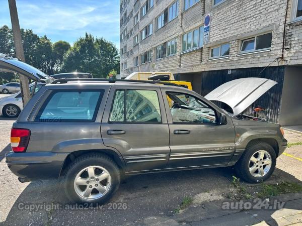 Pelēks Jeep Grand Cherokee 2002 Narva, ar dzinēja tilpumu 4.70 L un nobraukumu 215 tūkst. km par 5500 €, foto 3 vietnē AUTOMOTO.COM.LV