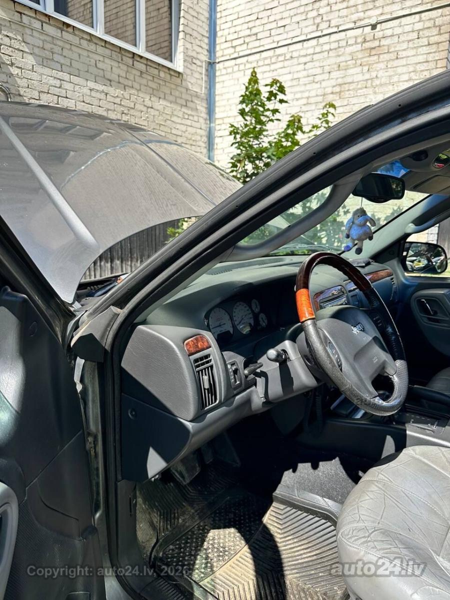 Pelēks Jeep Grand Cherokee 2002 Narva, ar dzinēja tilpumu 4.70 L un nobraukumu 215 tūkst. km par 5500 €, foto 21 vietnē AUTOMOTO.COM.LV