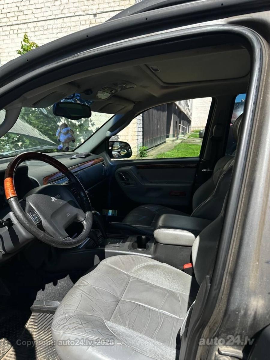 Pelēks Jeep Grand Cherokee 2002 Narva, ar dzinēja tilpumu 4.70 L un nobraukumu 215 tūkst. km par 5500 €, foto 22 vietnē AUTOMOTO.COM.LV