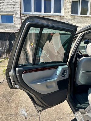 Pelēks Jeep Grand Cherokee 2002 Narva, ar dzinēja tilpumu 4.70 L un nobraukumu 215 tūkst. km par 5500 €, foto 23 vietnē AUTOMOTO.COM.LV
