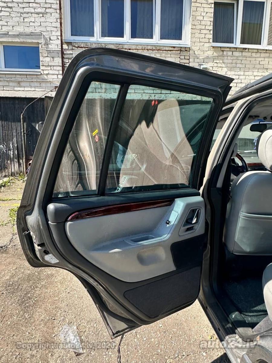Pelēks Jeep Grand Cherokee 2002 Narva, ar dzinēja tilpumu 4.70 L un nobraukumu 215 tūkst. km par 5500 €, foto 23 vietnē AUTOMOTO.COM.LV