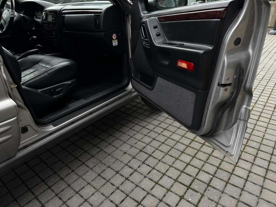 Pelēks Jeep Grand Cherokee 2002 Ukmergė, ar dzinēja tilpumu 2.69 L un nobraukumu 230 tūkst. km par 2350 €, foto 10 vietnē AUTOMOTO.COM.LV