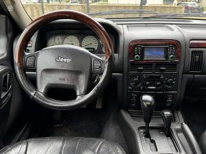Pelēks Jeep Grand Cherokee 2002 Ukmergė, ar dzinēja tilpumu 2.69 L un nobraukumu 230 tūkst. km par 2350 €, foto 17 vietnē AUTOMOTO.COM.LV