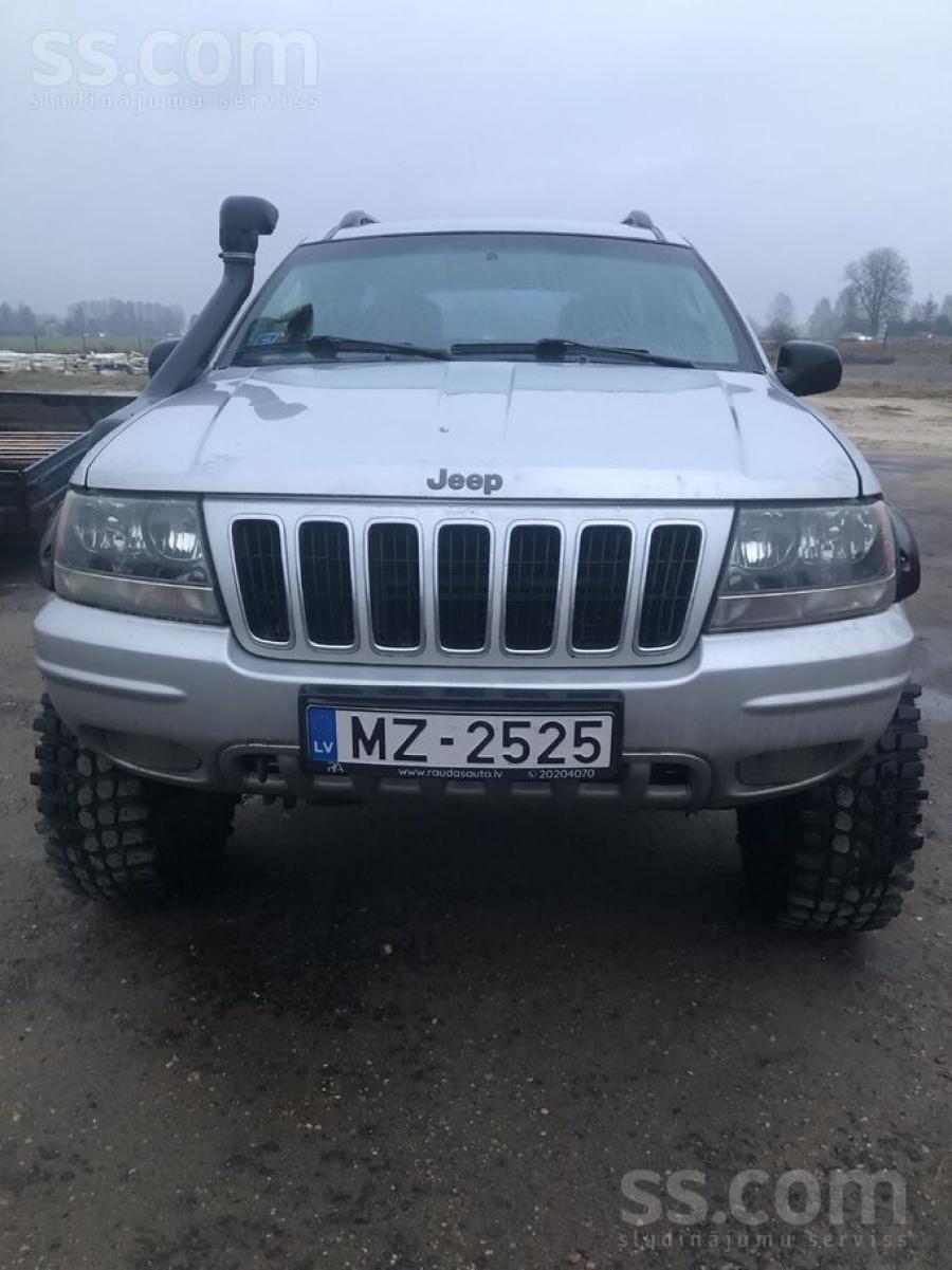 Grey Jeep Grand Cherokee 2003 in Riga, with an engine capacity of 2.70 L and mileage of 390 thousand km for 6999 €, photo 1 on AUTOMOTO.COM.LV