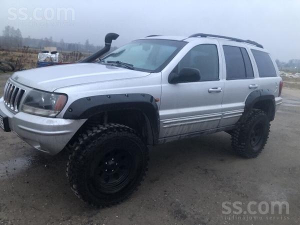 Grey Jeep Grand Cherokee 2003 in Riga, with an engine capacity of 2.70 L and mileage of 390 thousand km for 6999 €, photo 4 on AUTOMOTO.COM.LV