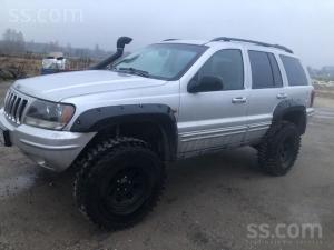Grey Jeep Grand Cherokee 2003 in Riga, with an engine capacity of 2.70 L and mileage of 390 thousand km for 6999 €, photo 4 on AUTOMOTO.COM.LV