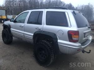 Grey Jeep Grand Cherokee 2003 in Riga, with an engine capacity of 2.70 L and mileage of 390 thousand km for 6999 €, photo 5 on AUTOMOTO.COM.LV
