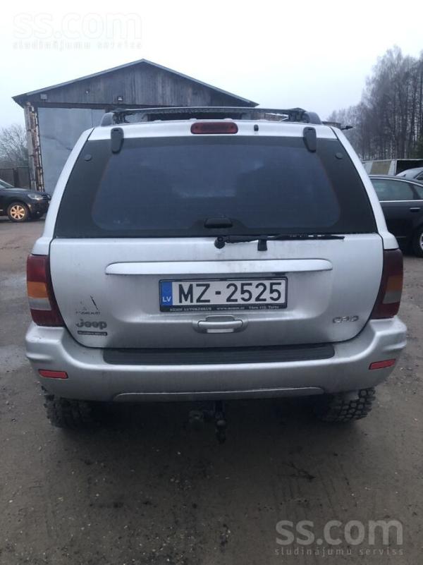 Grey Jeep Grand Cherokee 2003 in Riga, with an engine capacity of 2.70 L and mileage of 390 thousand km for 6999 €, photo 7 on AUTOMOTO.COM.LV