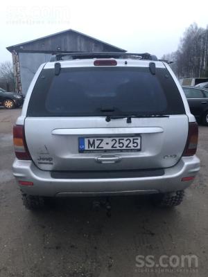 Grey Jeep Grand Cherokee 2003 in Riga, with an engine capacity of 2.70 L and mileage of 390 thousand km for 6999 €, photo 7 on AUTOMOTO.COM.LV