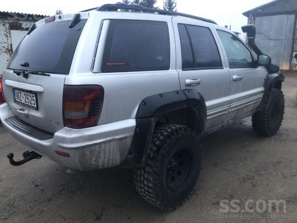 Grey Jeep Grand Cherokee 2003 in Riga, with an engine capacity of 2.70 L and mileage of 390 thousand km for 6999 €, photo 8 on AUTOMOTO.COM.LV