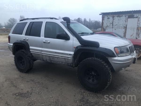 Grey Jeep Grand Cherokee 2003 in Riga, with an engine capacity of 2.70 L and mileage of 390 thousand km for 6999 €, photo 9 on AUTOMOTO.COM.LV