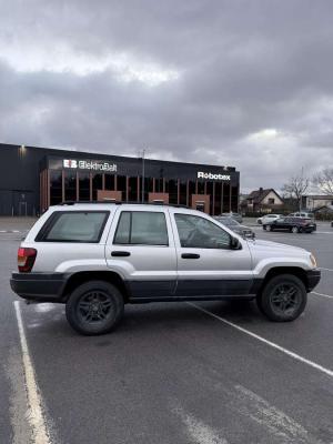 Grey Jeep Grand Cherokee 2003 in Kaunas, with an engine capacity of 2.69 L and mileage of 320 thousand km for 3800 €, photo 2 on AUTOMOTO.COM.LV