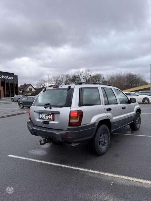 Grey Jeep Grand Cherokee 2003 in Kaunas, with an engine capacity of 2.69 L and mileage of 320 thousand km for 3800 €, photo 3 on AUTOMOTO.COM.LV
