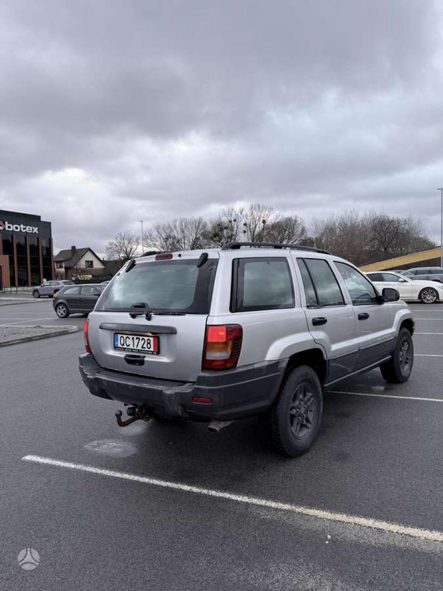Grey Jeep Grand Cherokee 2003 in Kaunas, with an engine capacity of 2.69 L and mileage of 320 thousand km for 3800 €, photo 3 on AUTOMOTO.COM.LV